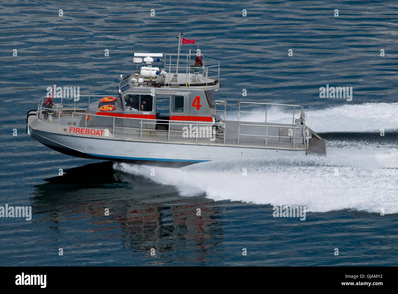 A modern fireboat moving at speed Stock Photo - Alamy