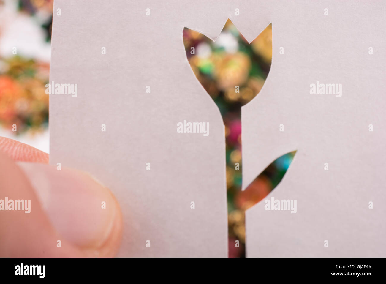 Tulip shape cut out of a paper with a colorful background Stock Photo ...