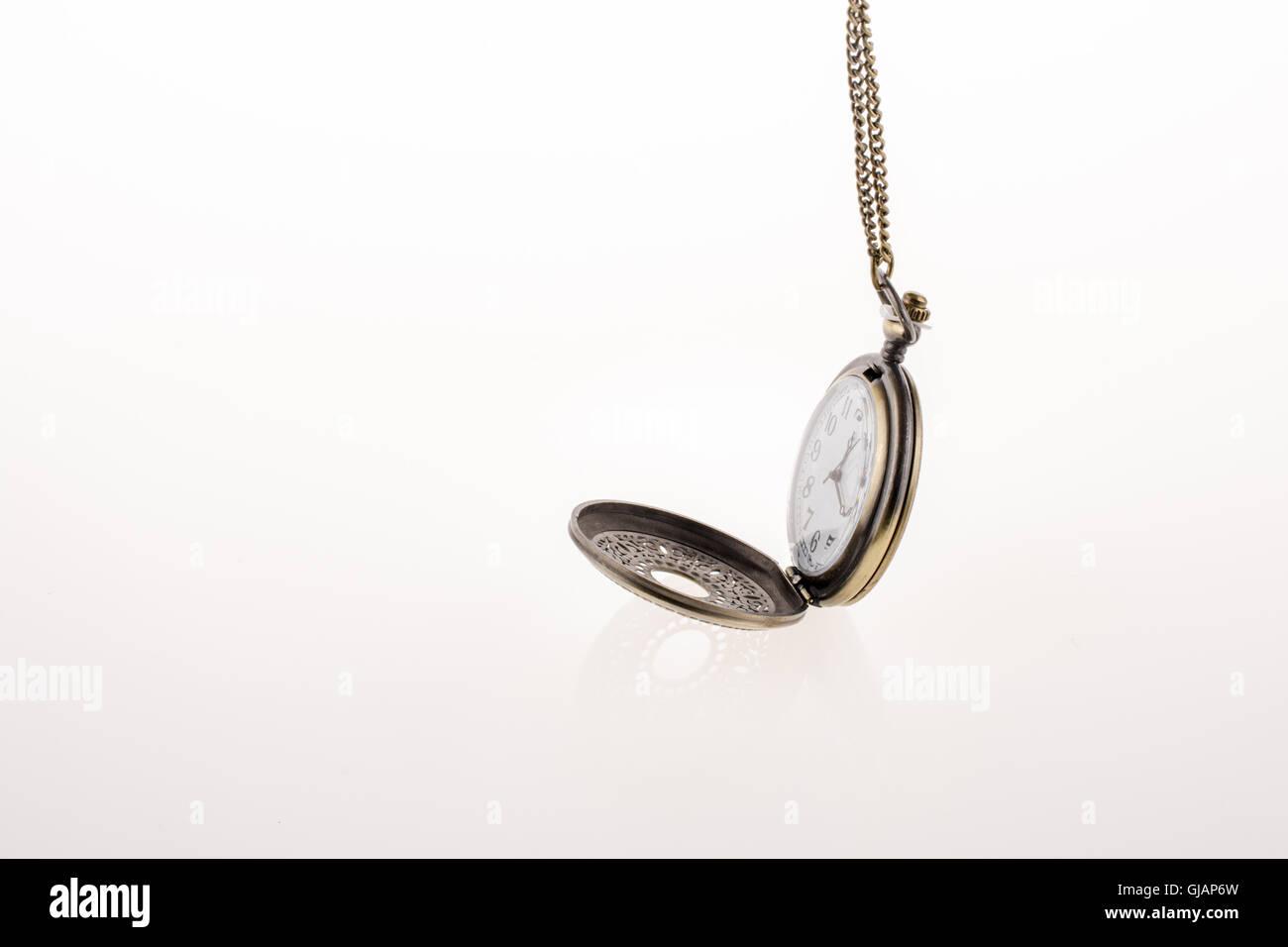 Isolated retro styled pocket watch on white background Stock Photo - Alamy