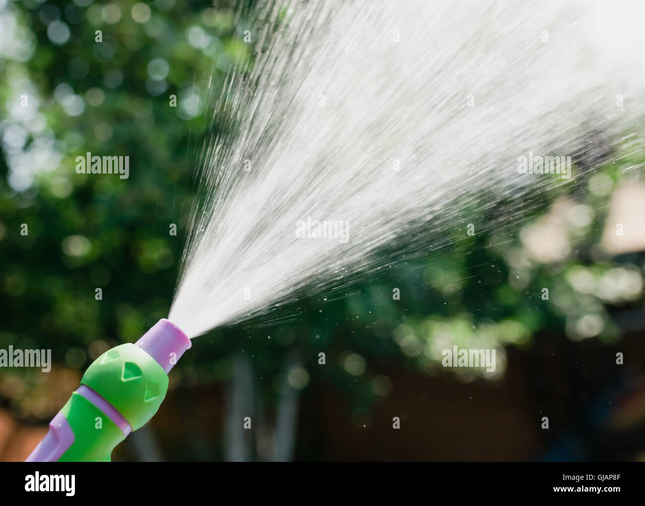 Hand sprinkler hi-res stock photography and images - Alamy