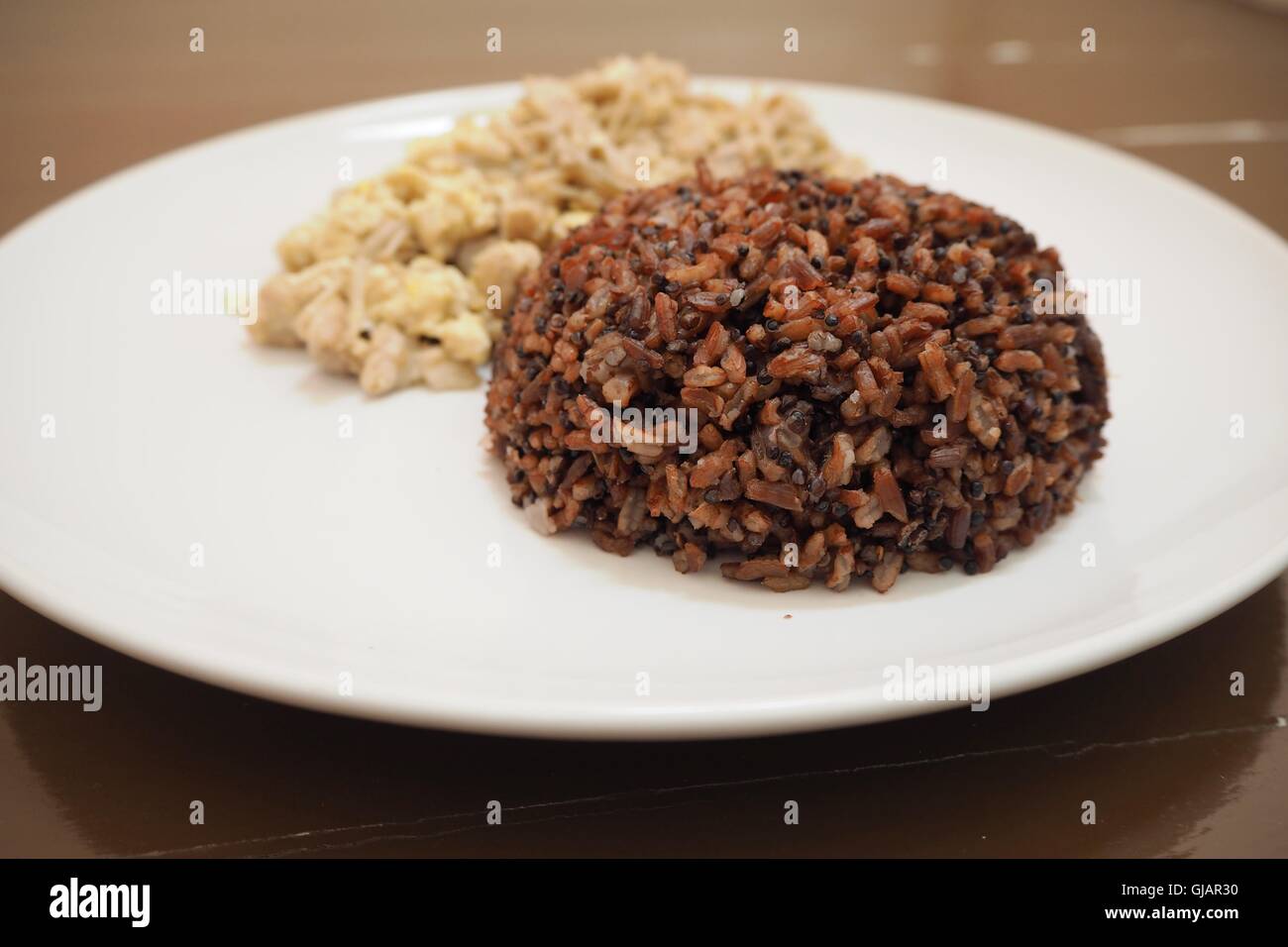 Red rice steamed with quinoa Stock Photo - Alamy