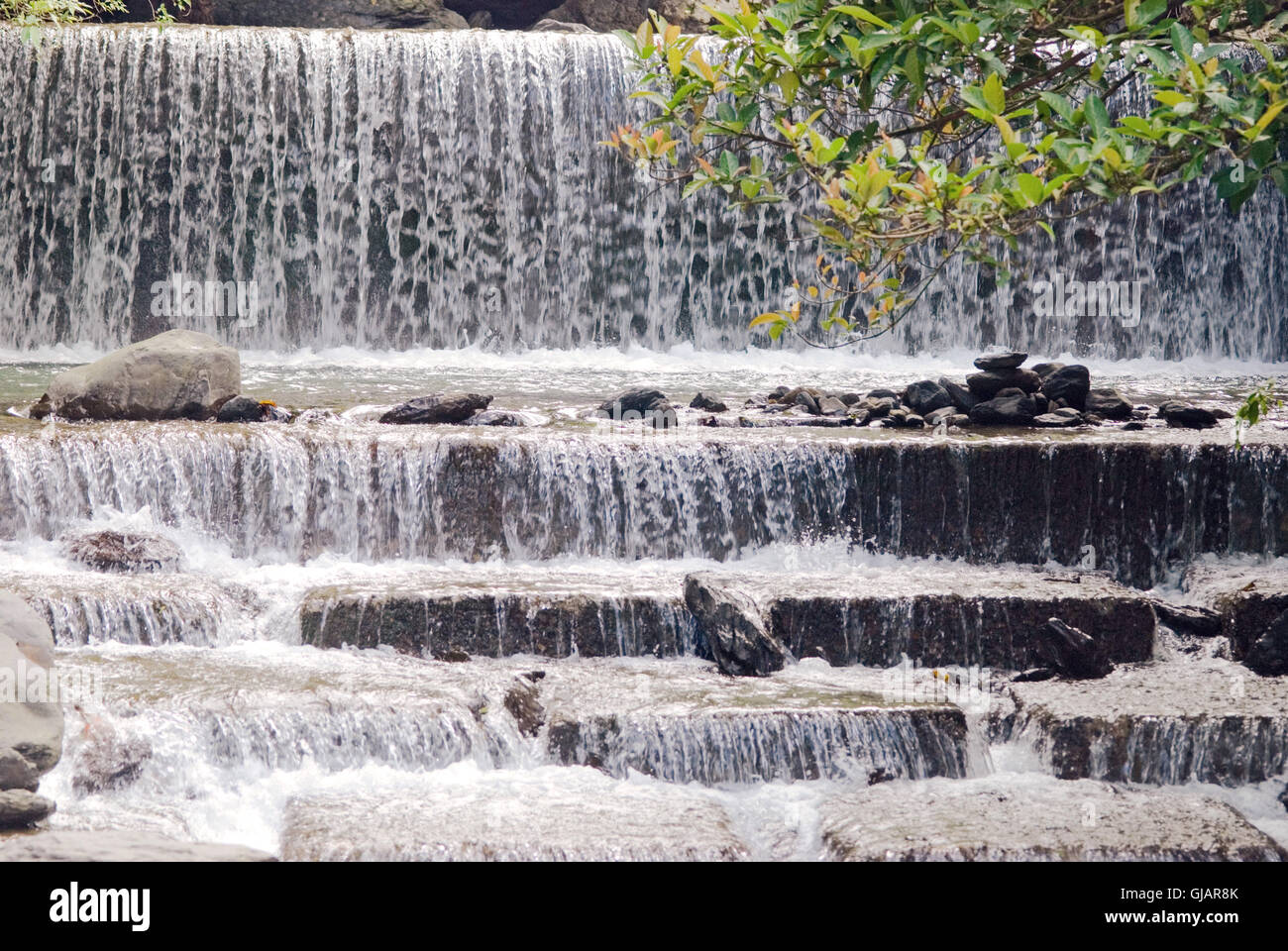 Waterfall with fish ladder Stock Photo - Alamy