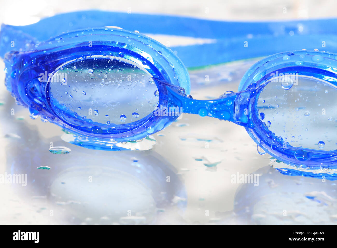 Wet Swimming Goggles Stock Photo - Alamy