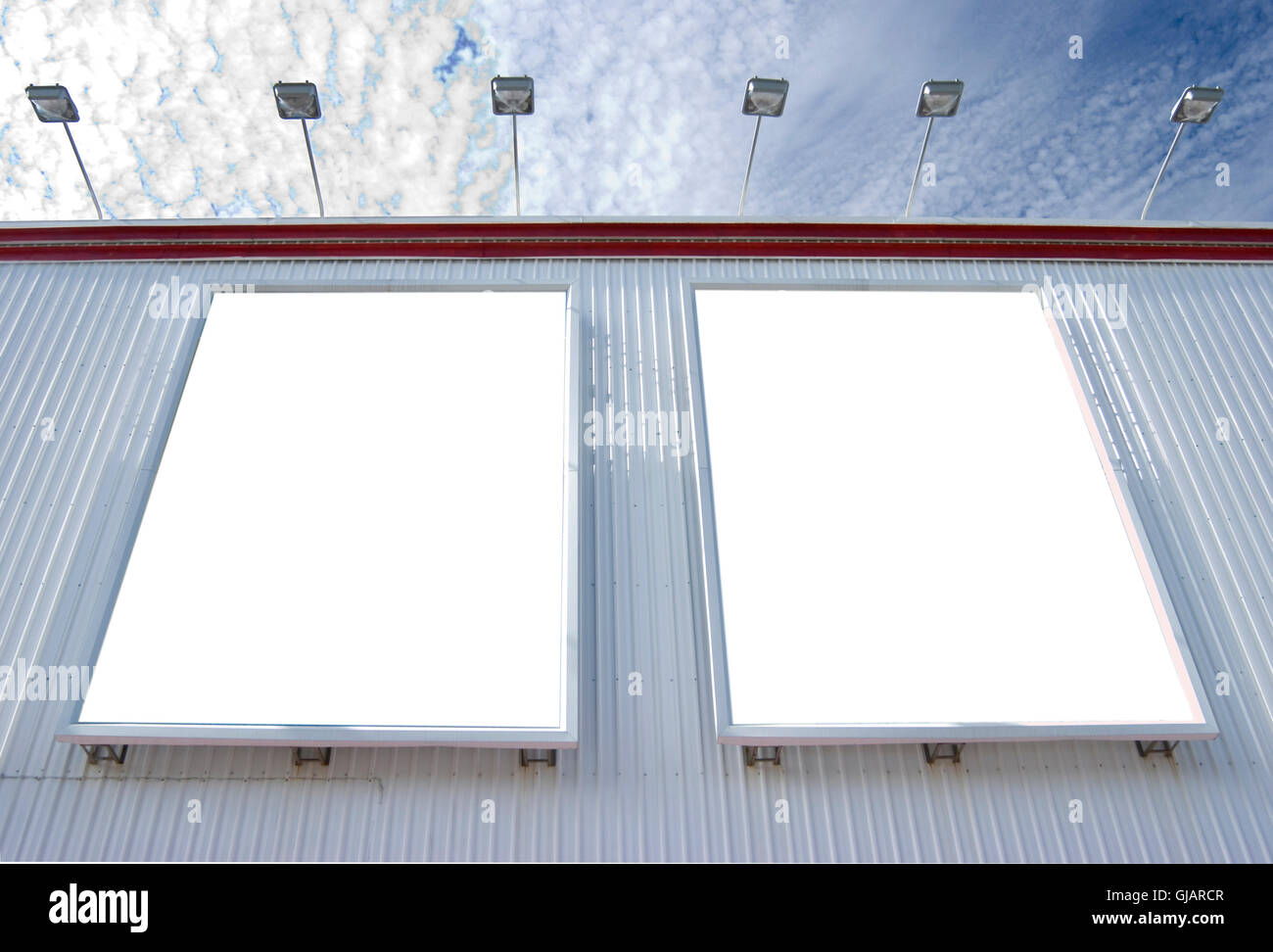 multiple blank billboard with lamps Stock Photo - Alamy