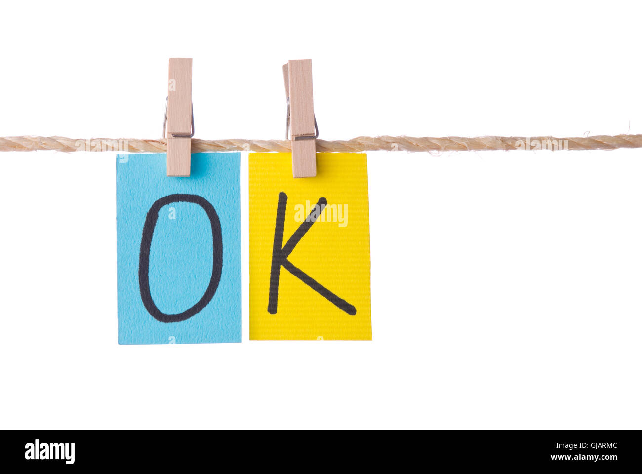 OK Colorful words hang on rope Stock Photo - Alamy