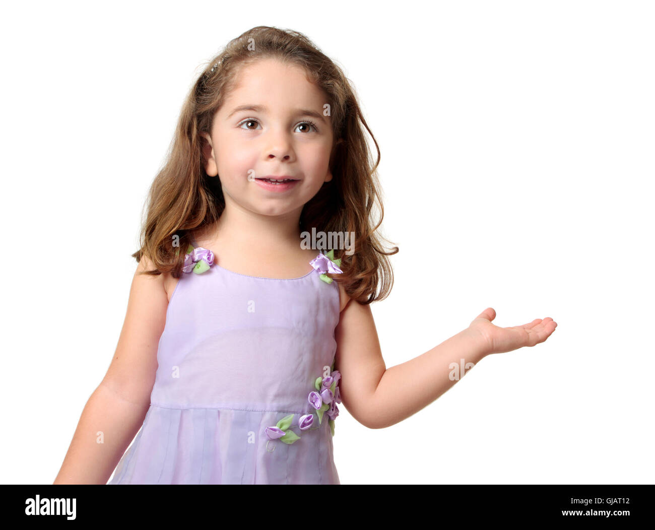 Pretty smiling girl showing hand outstretched Stock Photo - Alamy