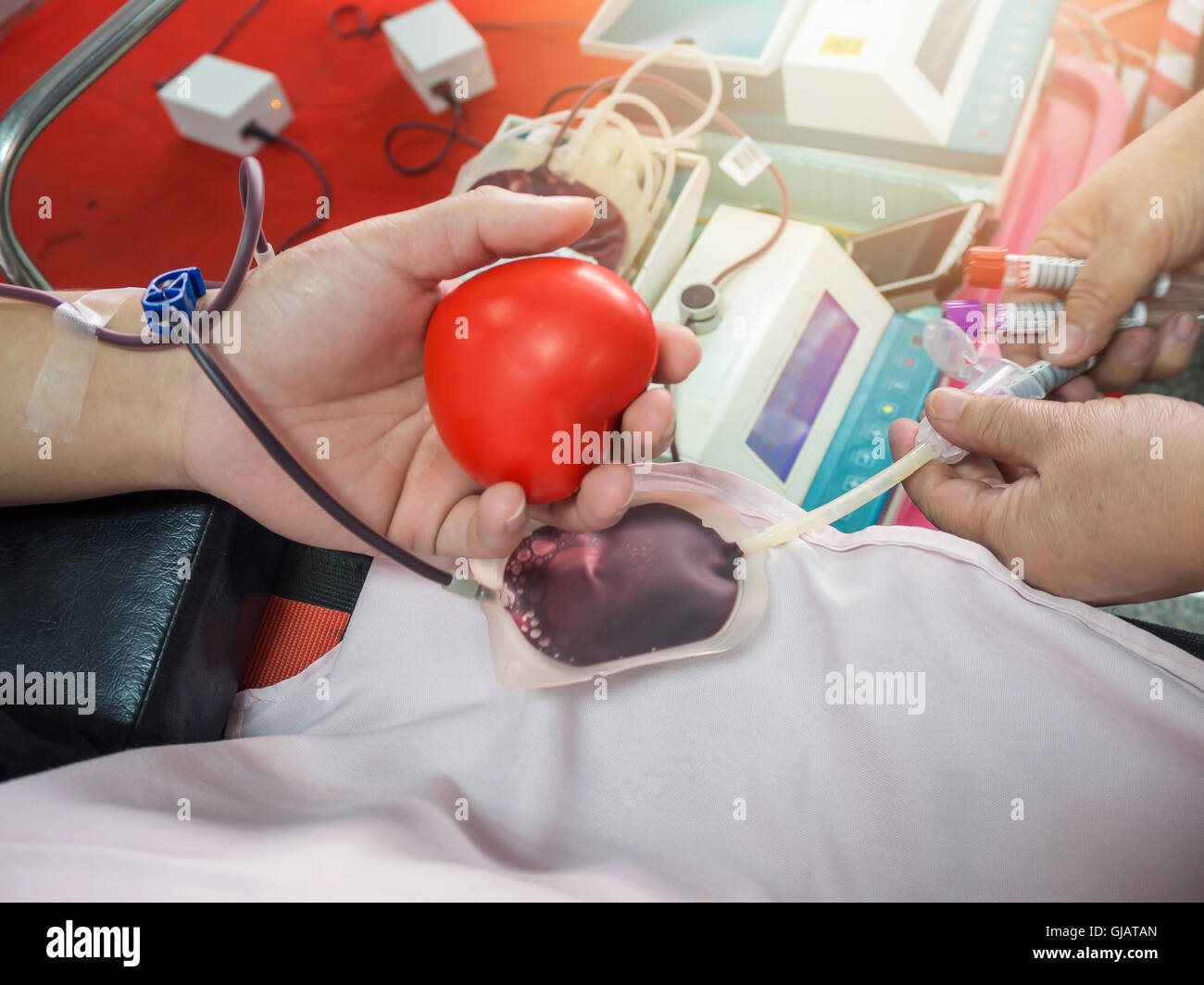 Nurse receiving blood from blood donor in hospital Stock Photo - Alamy