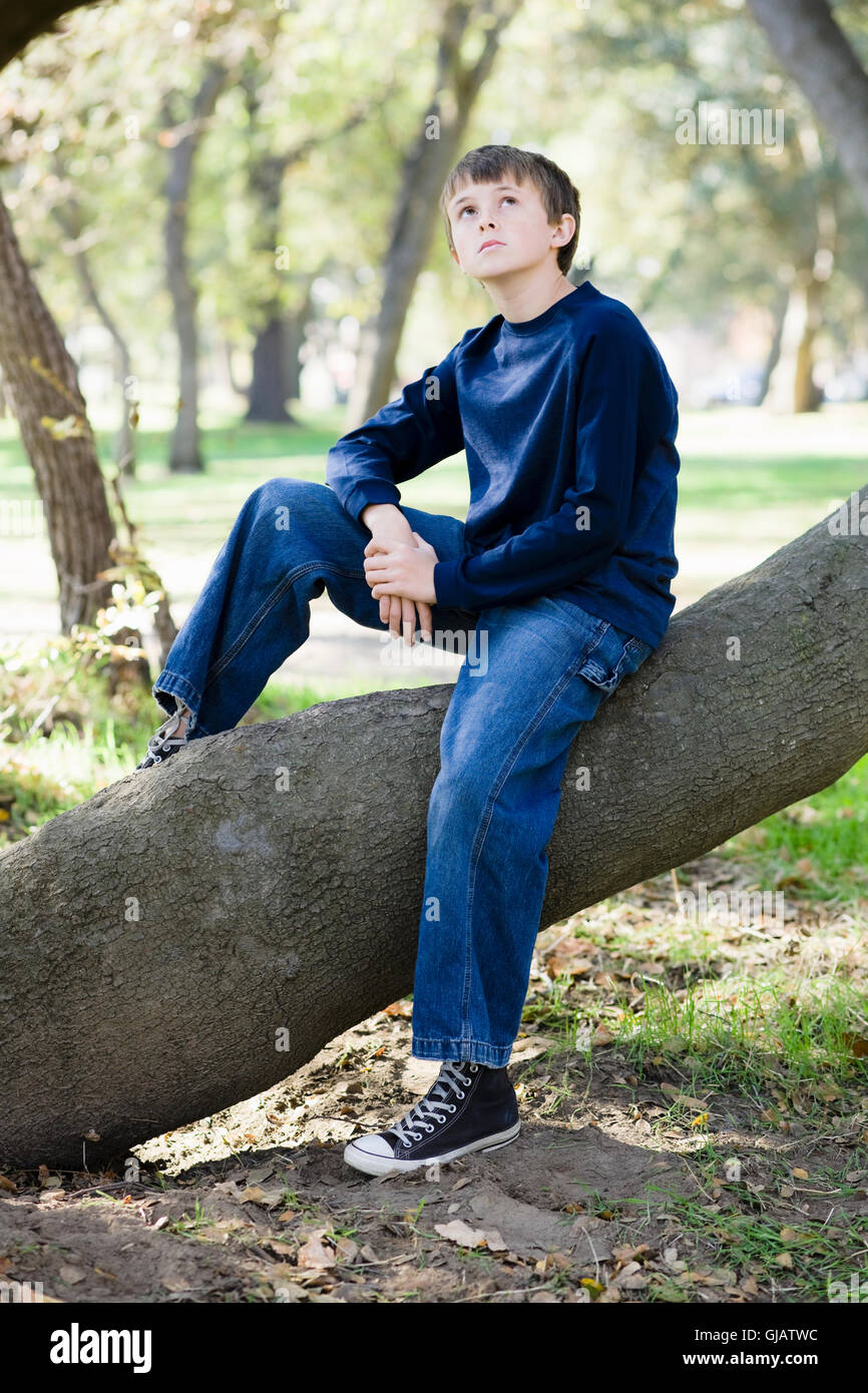 Young Boy in Park Stock Photo - Alamy