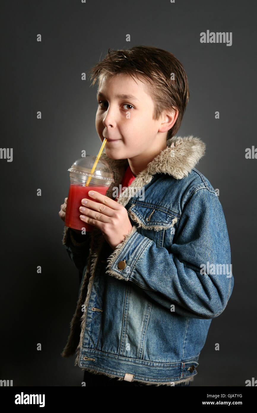 Boy with Tasty Berry Juice Stock Photo - Alamy