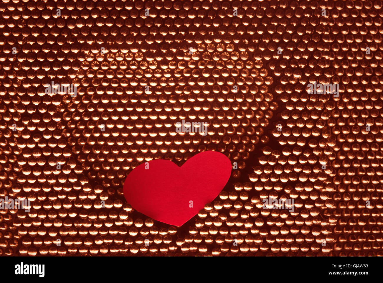 Red paper heart into steel herat shape Stock Photo - Alamy