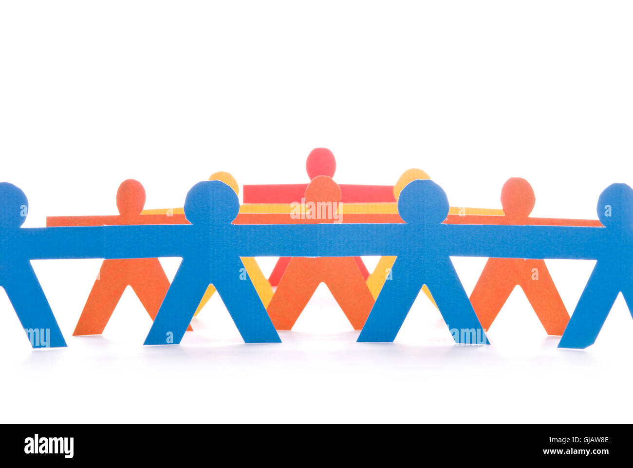 Concept of teamwork, colorful paper dolls Stock Photo - Alamy