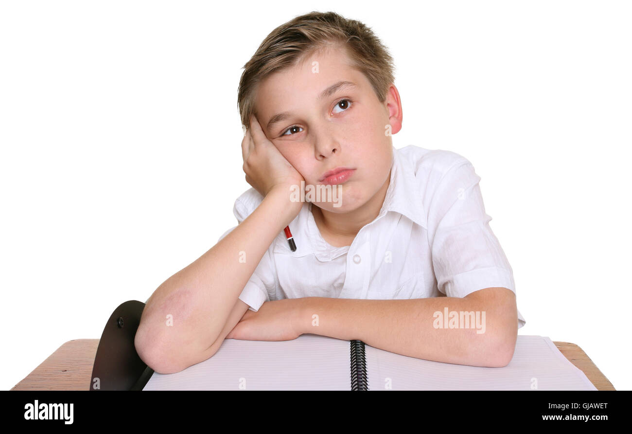Schoolboy daydreaming in classroom hi-res stock photography and images ...