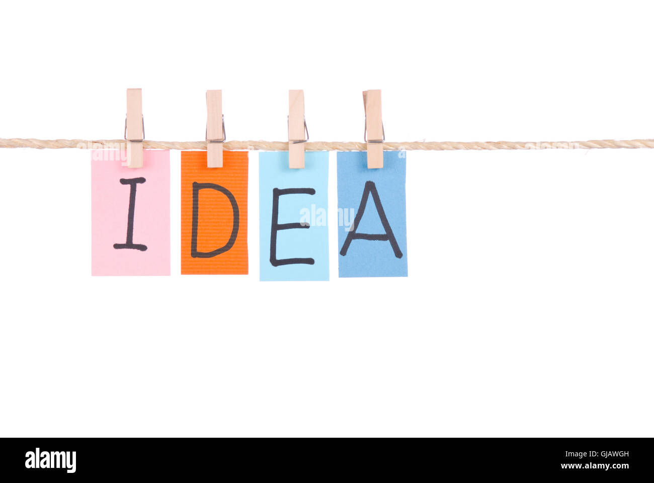 Idea, Colorful words hang on rope Stock Photo - Alamy
