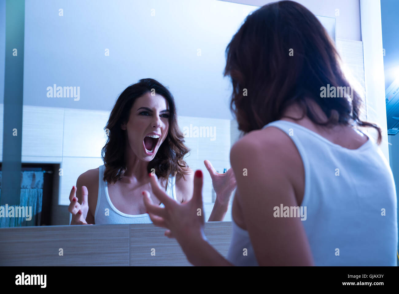 Angry woman mirror hi-res stock photography and images - Alamy