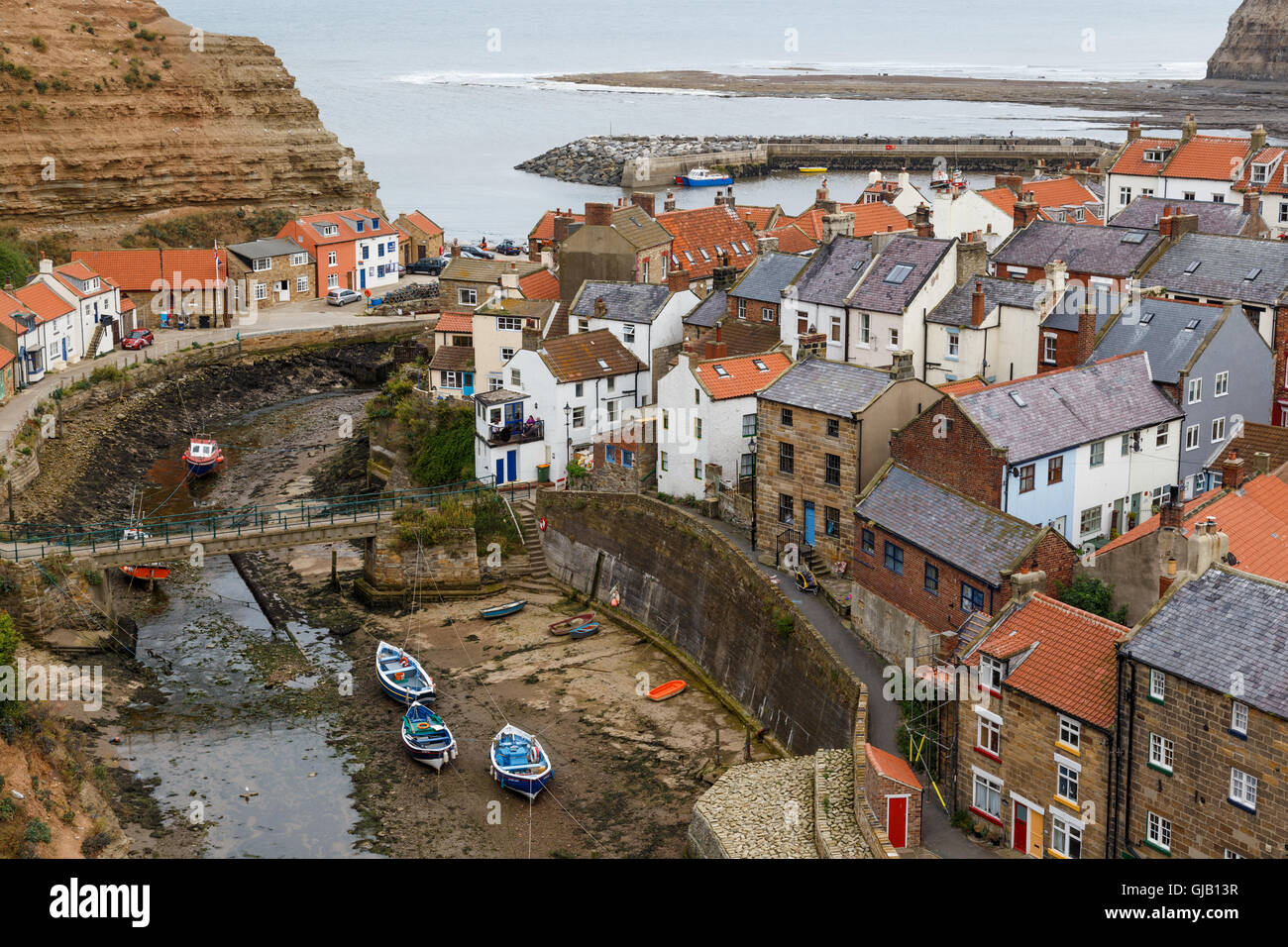 High view looking down onto Staithes Beck and the town. In Staithes ...