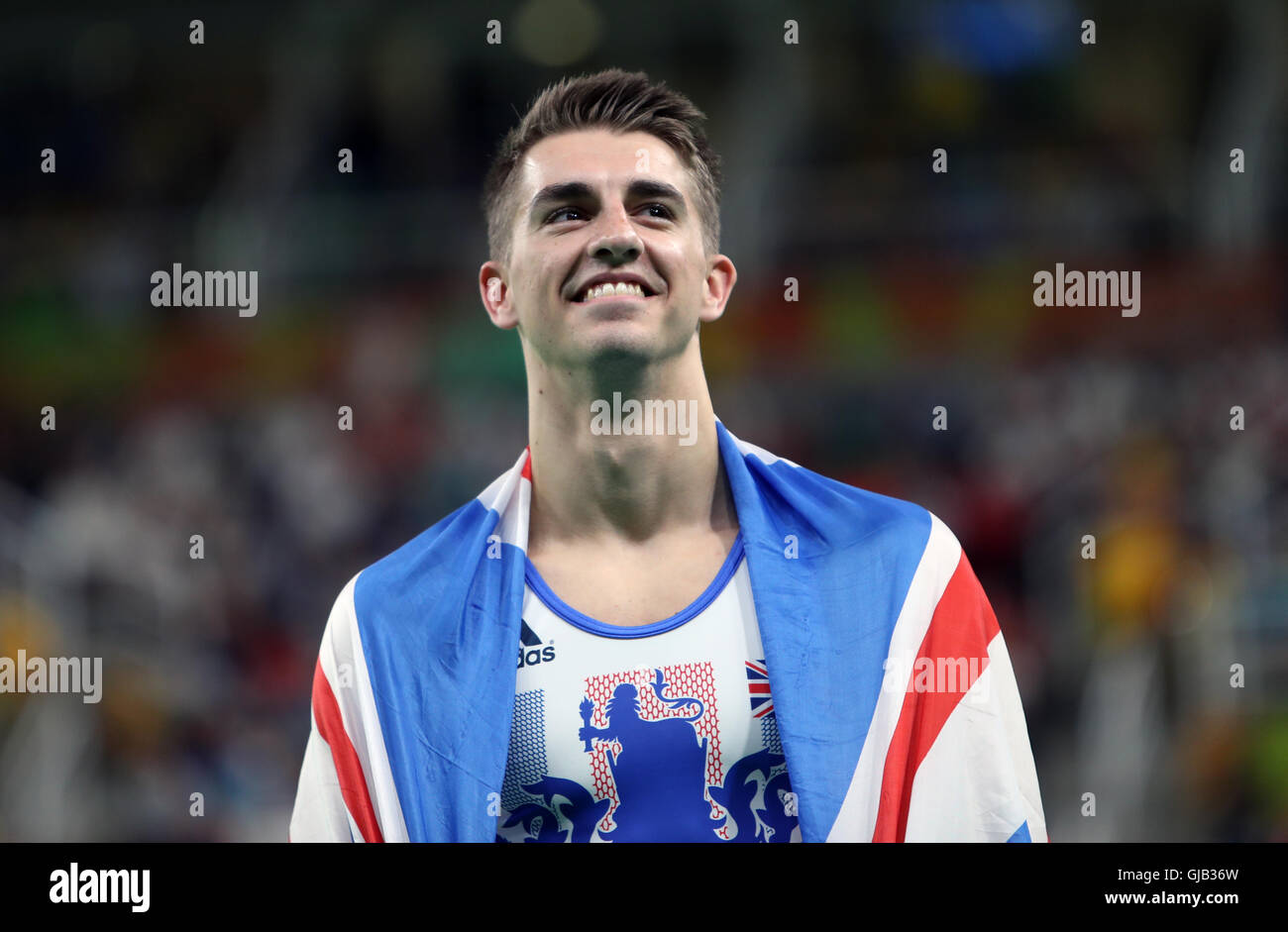 Great Britain's Max Whitlock celebrates winning a gold medal following ...