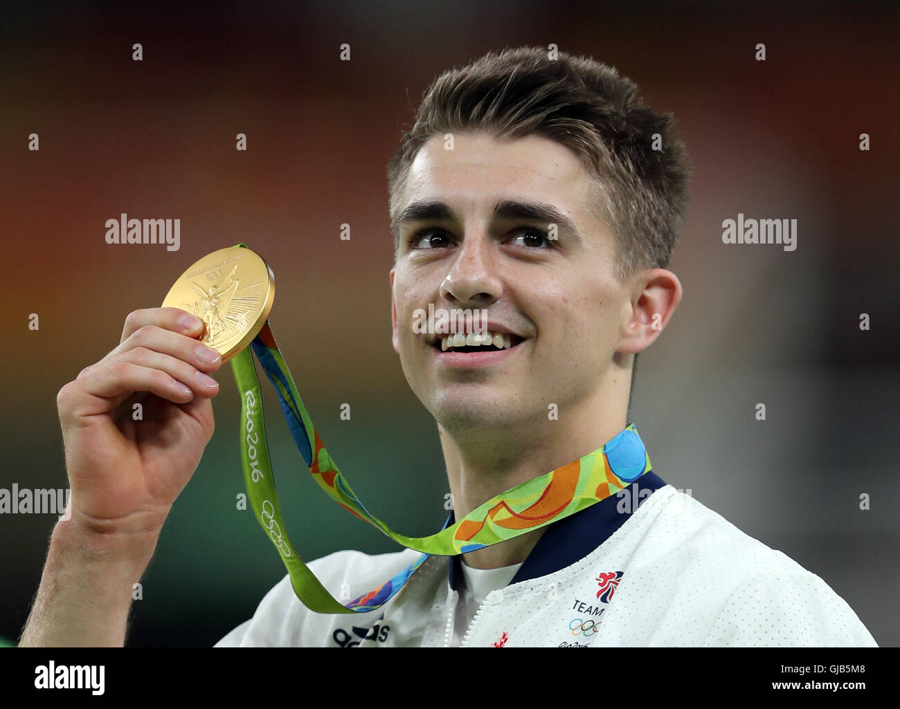 Great Britain's Max Whitlock celebrates winning a gold medal following ...