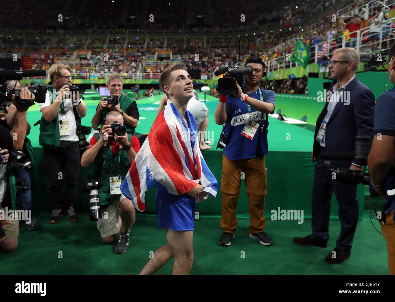 Great Britain's Max Whitlock celebrates winning a gold medal following ...