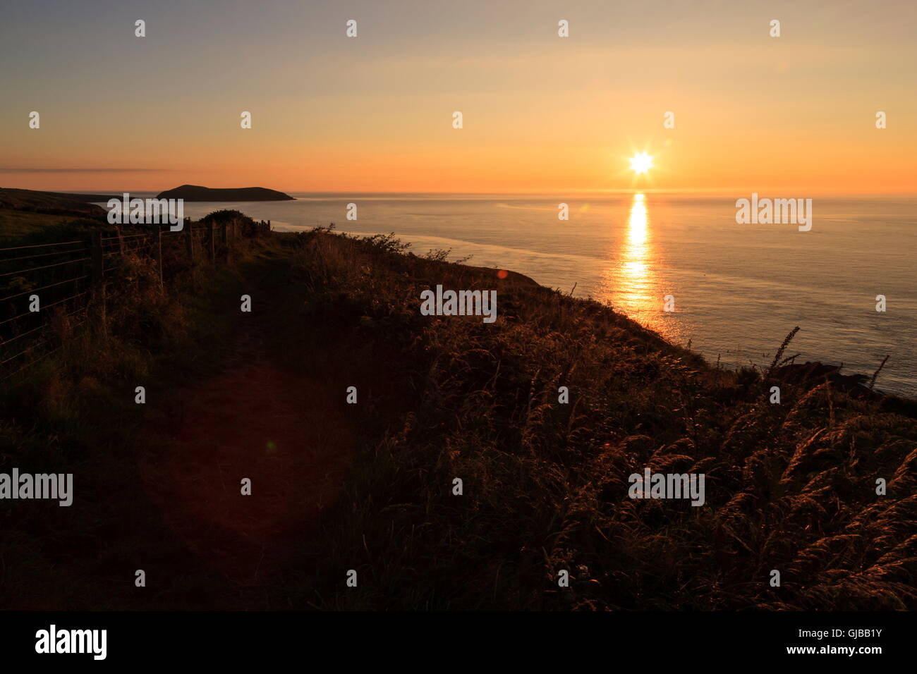 Sunset over Cardigan Bay Stock Photo - Alamy