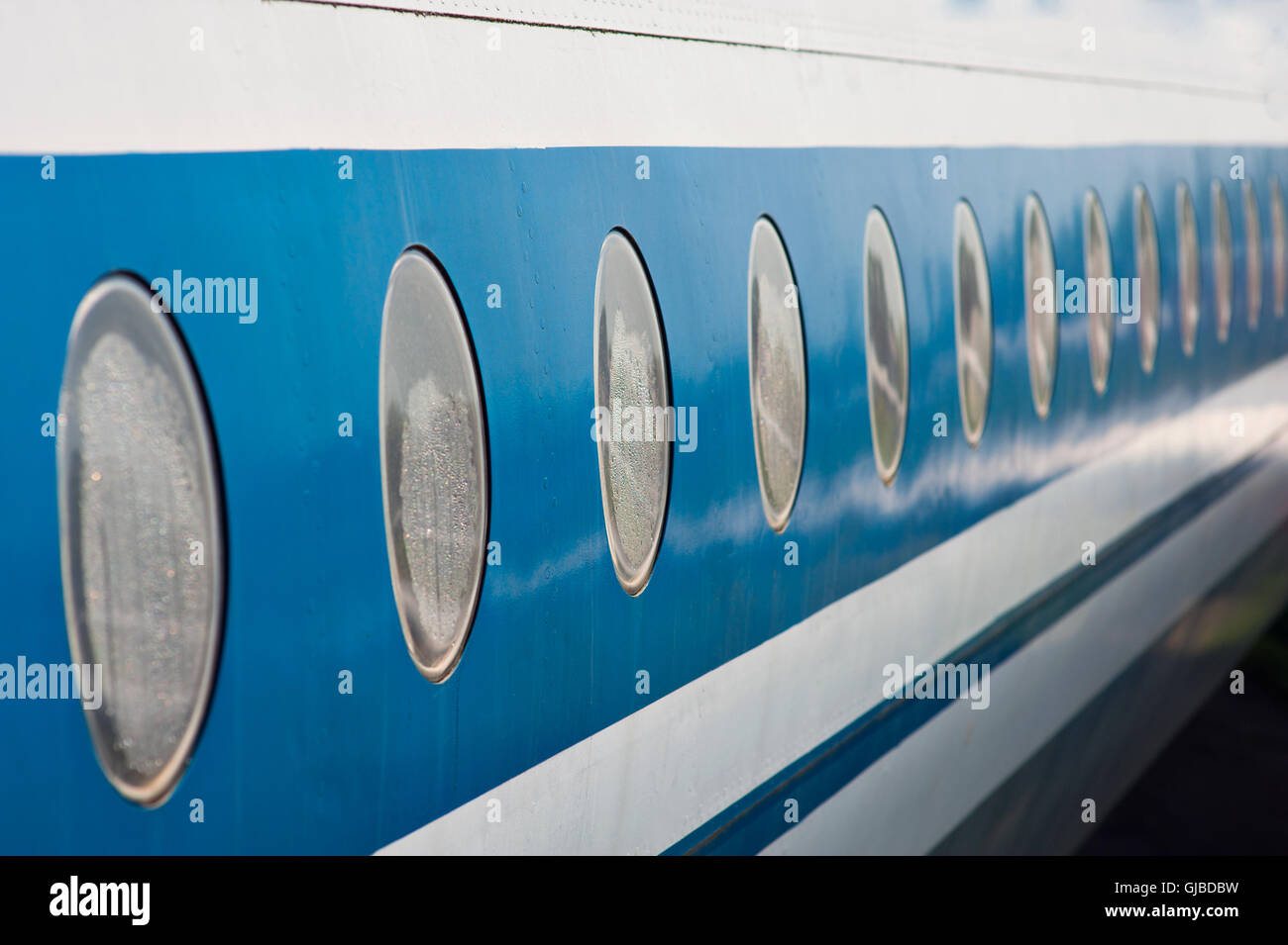 Passenger aircraft windows. View from outside Stock Photo - Alamy