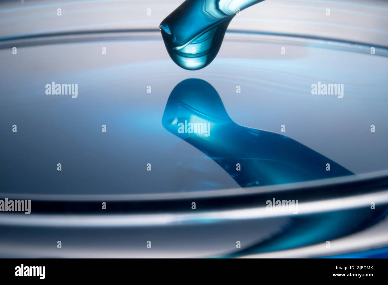 closeup of pipette dropper and blue water Stock Photo - Alamy