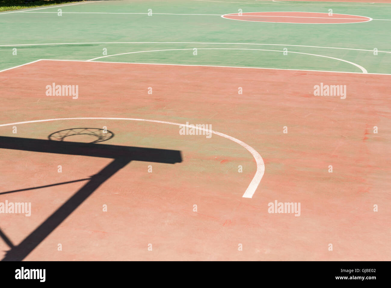shadow of the hoop board and frame in a basketball court Stock Photo ...