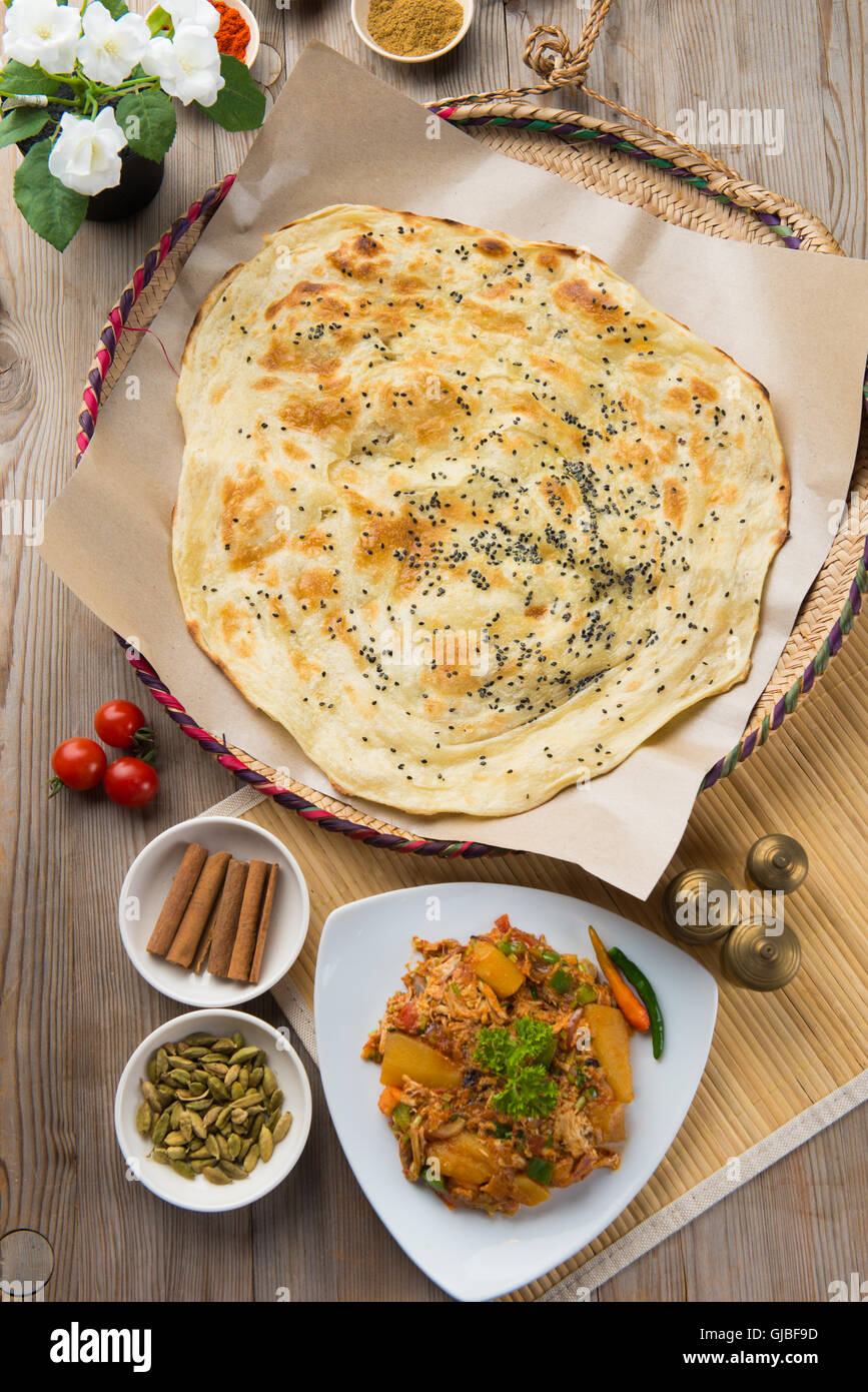 arabic oqda and Malawah bread top down view Stock Photo - Alamy