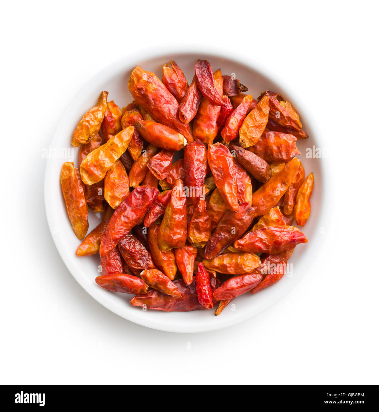 Dried mini chili peppers isolated on white background Stock Photo - Alamy