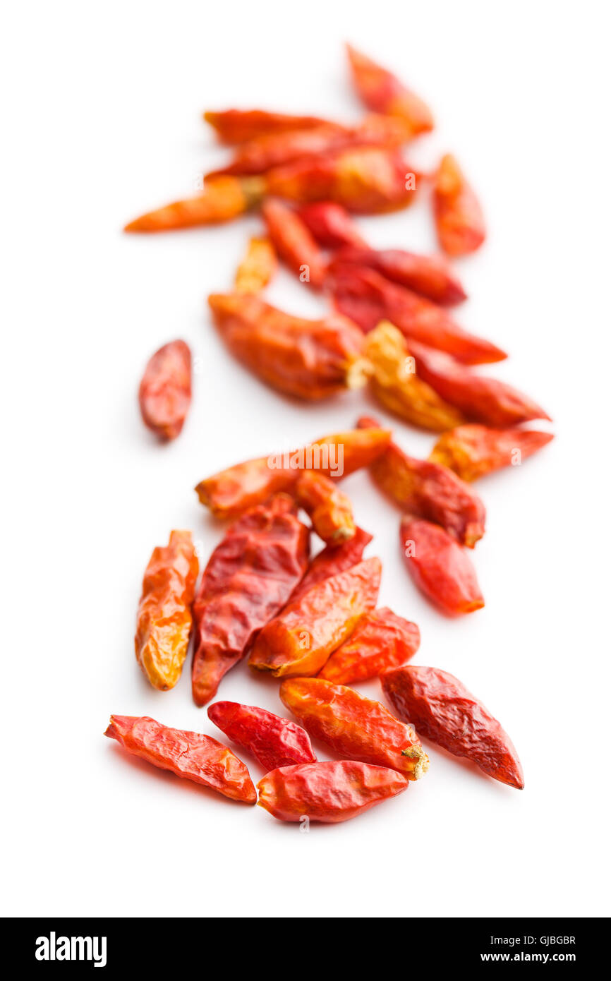 Dried mini chili peppers isolated on white background Stock Photo - Alamy