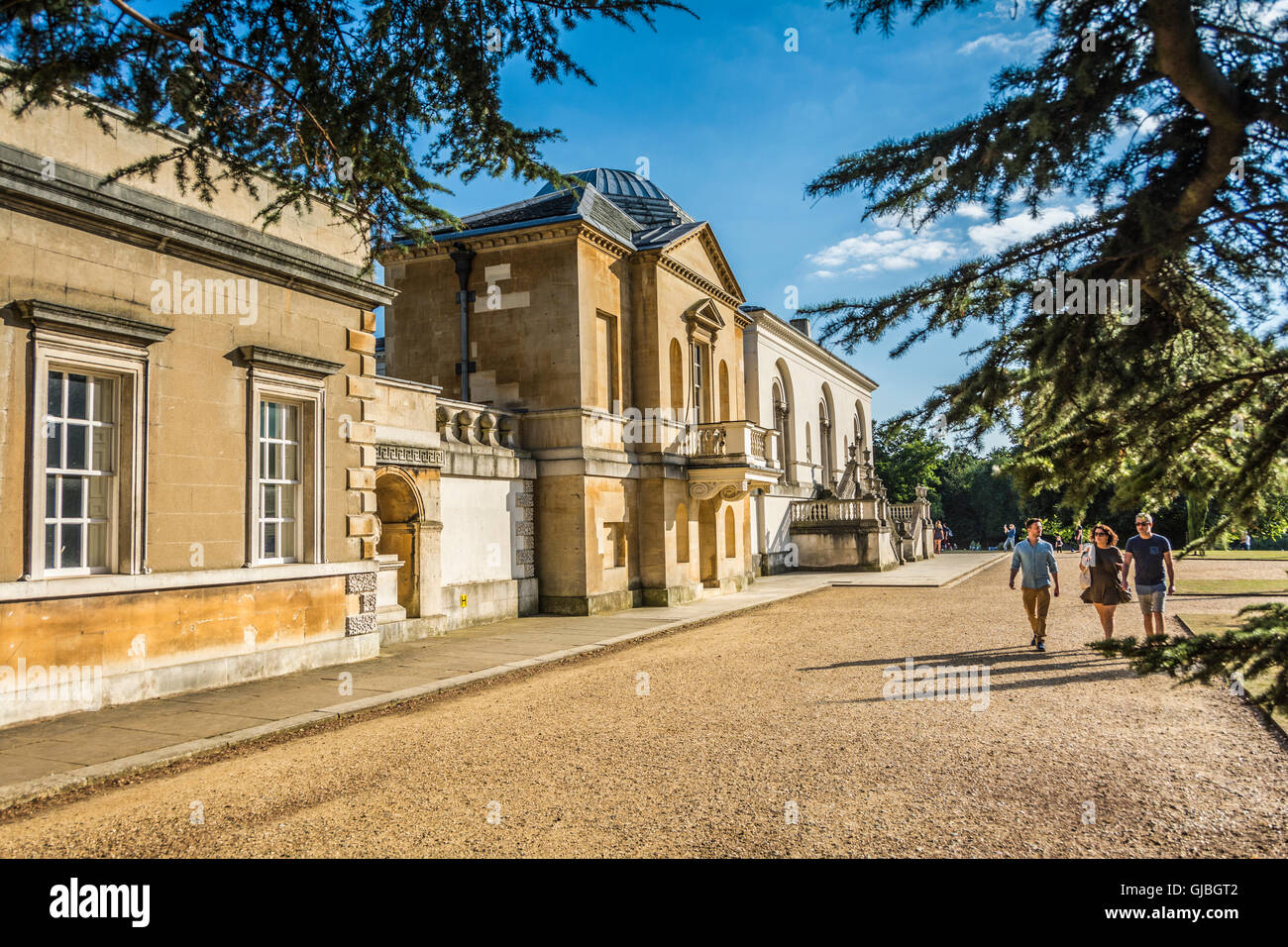 People walking in the grounds of Chiswick House, an early 18thC ...