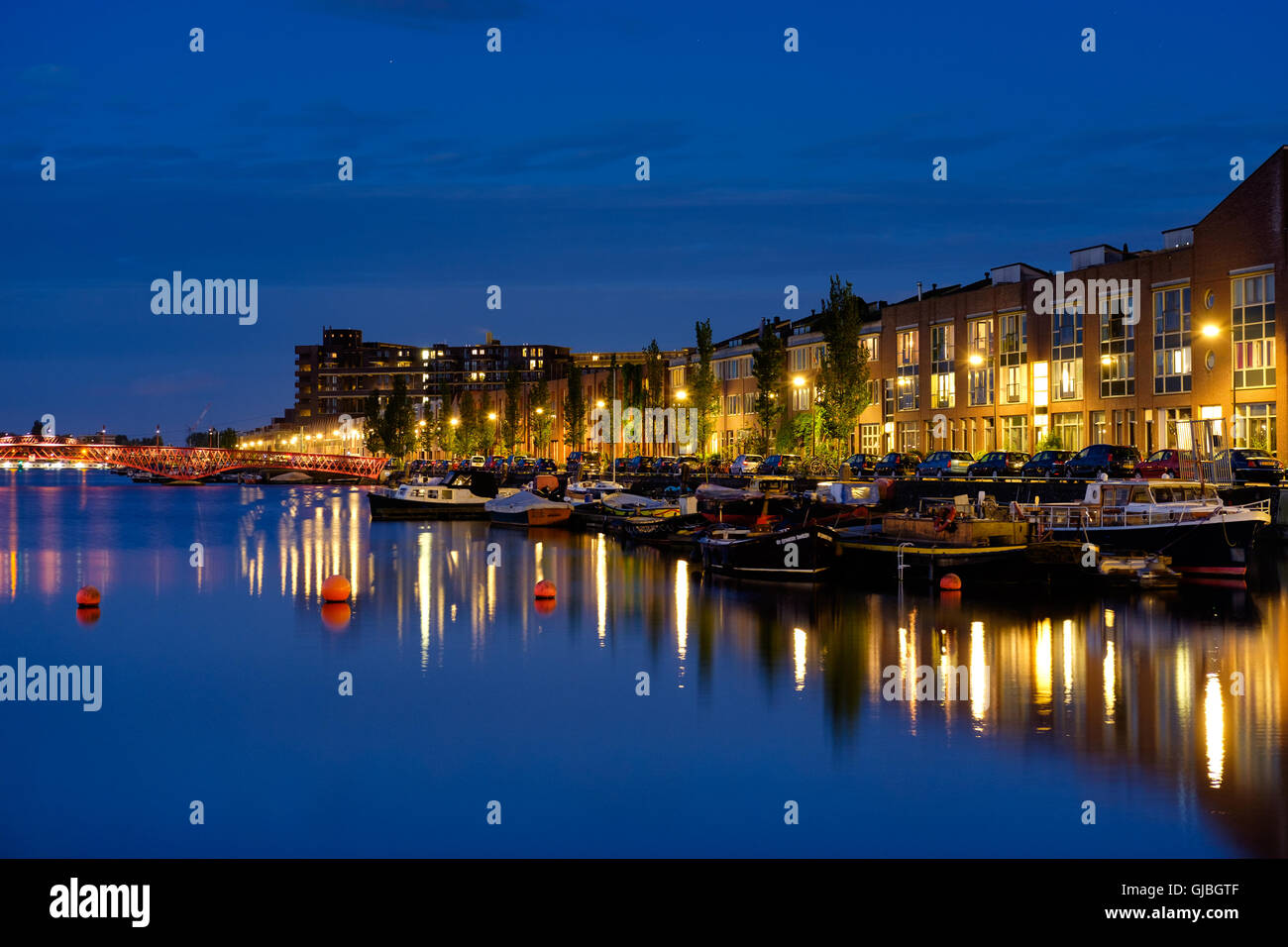 Amsterdam East By Night Stock Photo - Alamy