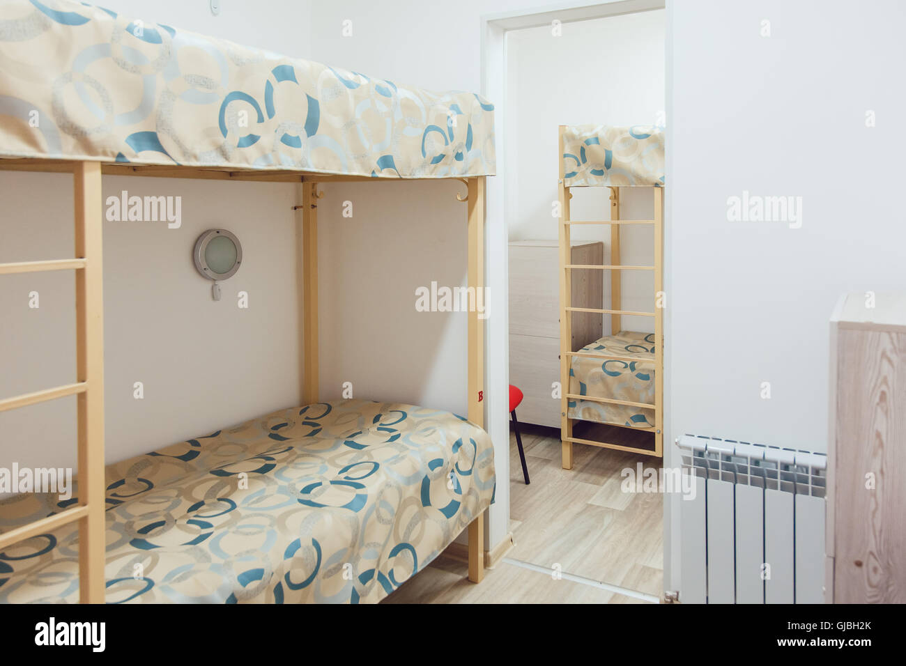 Hostel interior - bedroom. double bed. interior Stock Photo - Alamy