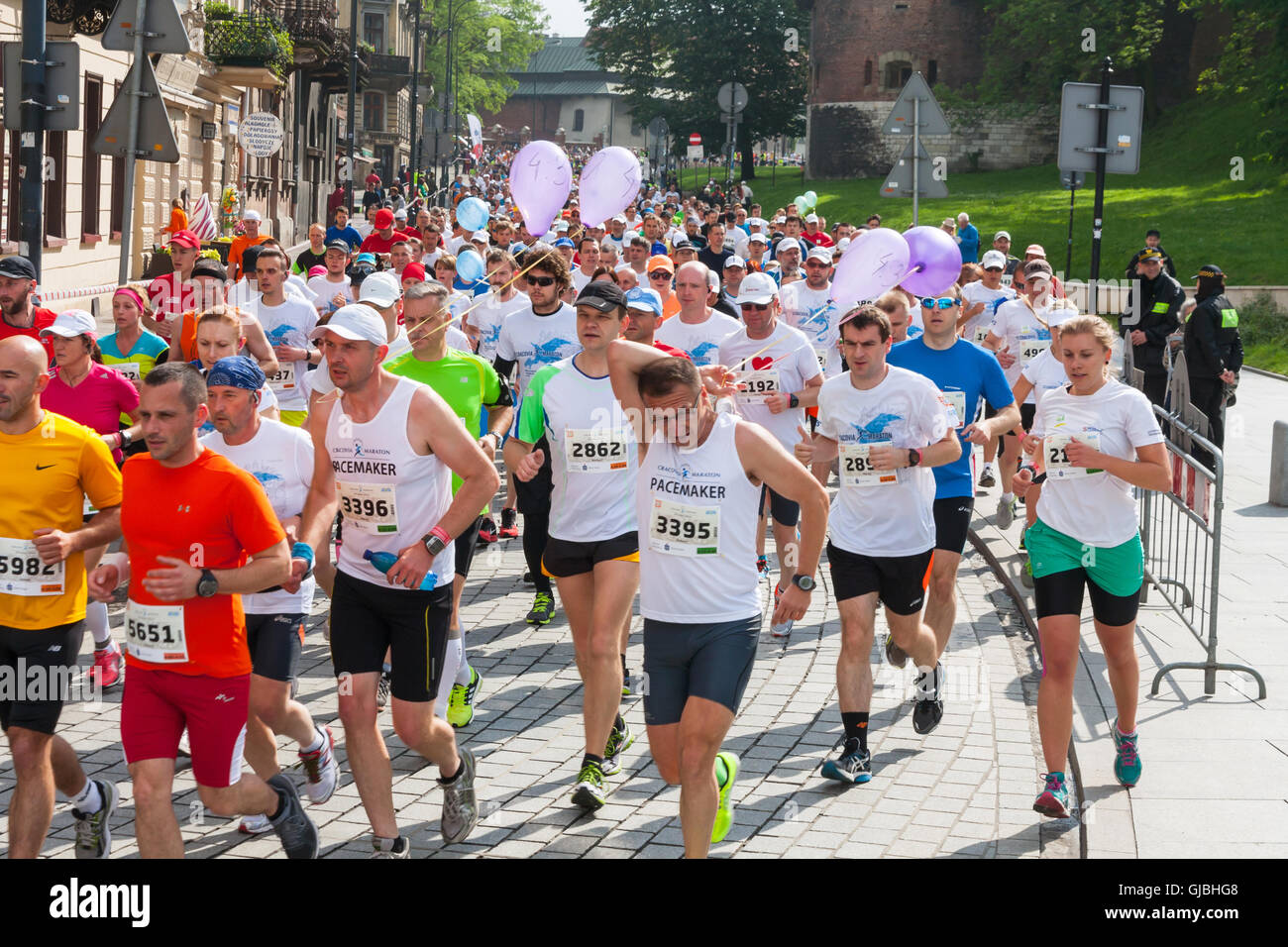 KRAKOW, POLAND - MAY 18 : Cracovia Marathon. Runners on the city ...