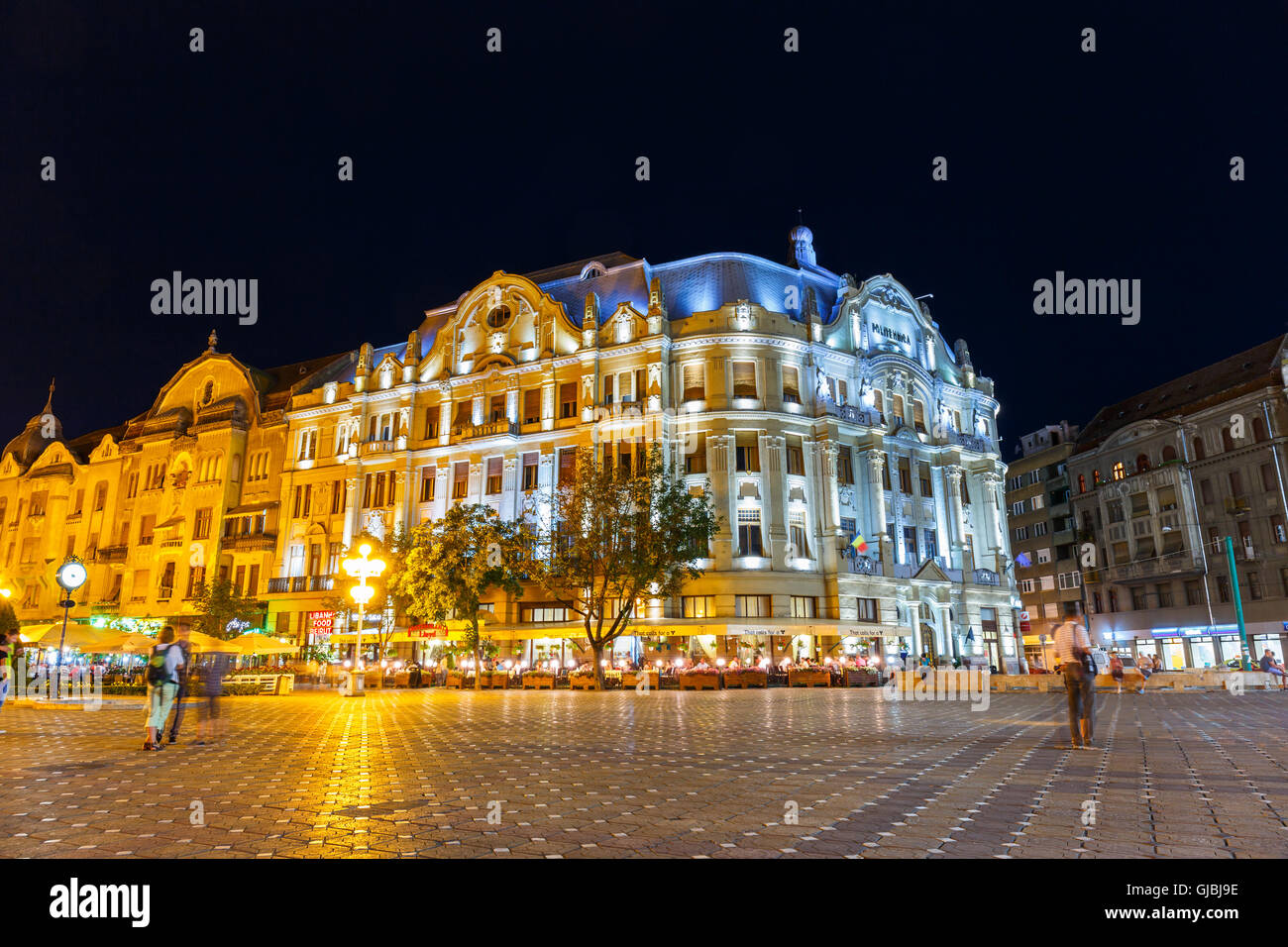 ROMANIA, TIMISOARA – JULY 22: Night view of city center in Timisoara on ...