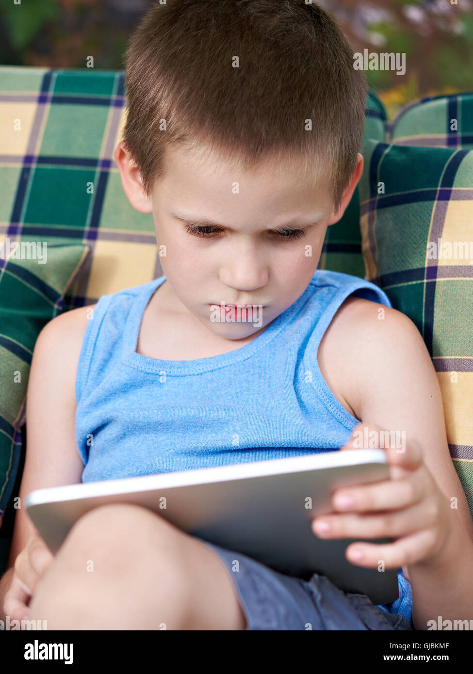 Little boy with tablet pc portrait Stock Photo - Alamy