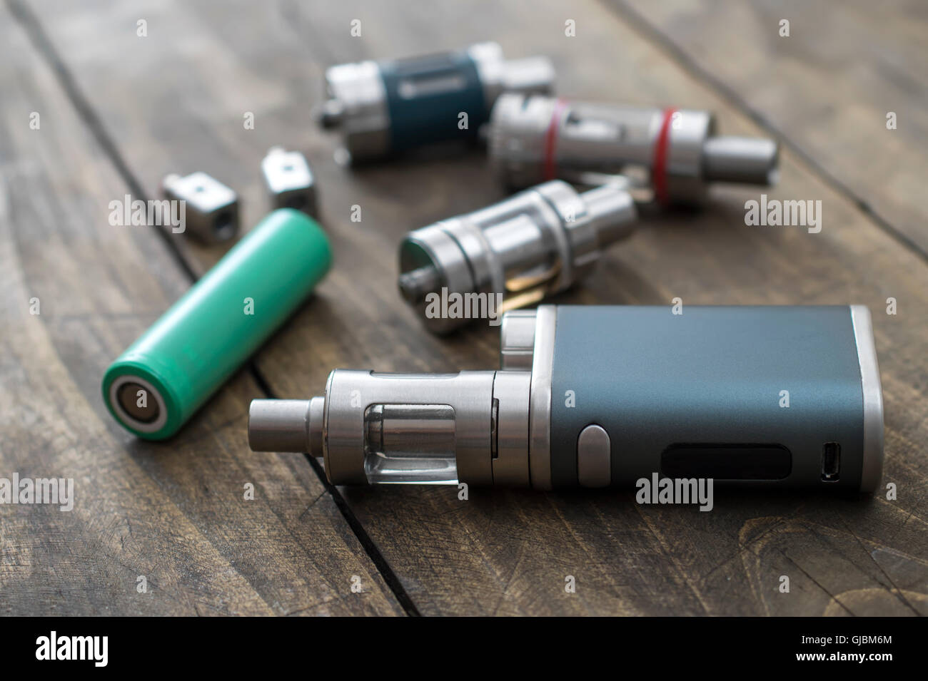 Advanced vaping device, e-cigarette on the table Stock Photo - Alamy