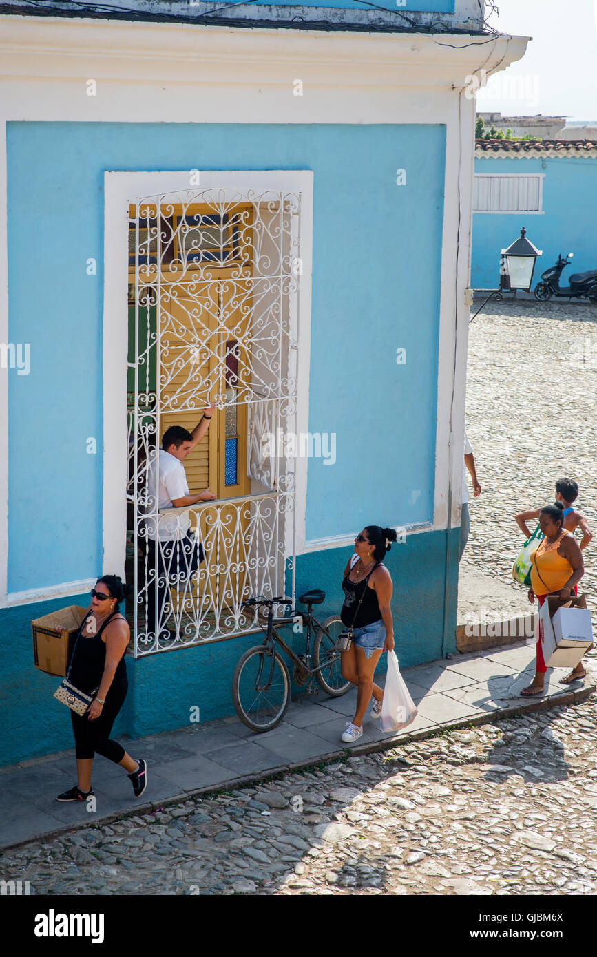 People walking pass window, Plaza Mayor, Trinidad, Cuba Stock Photo - Alamy
