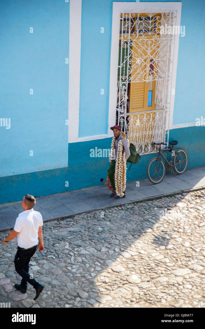 People walking pass window, Plaza Mayor, Trinidad, Cuba Stock Photo - Alamy
