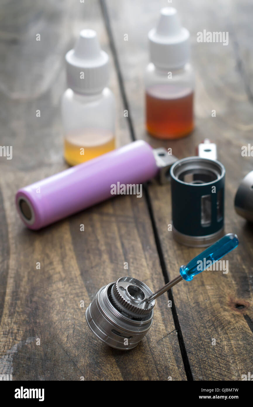 Advanced vaping device, e-cigarette on the table Stock Photo - Alamy