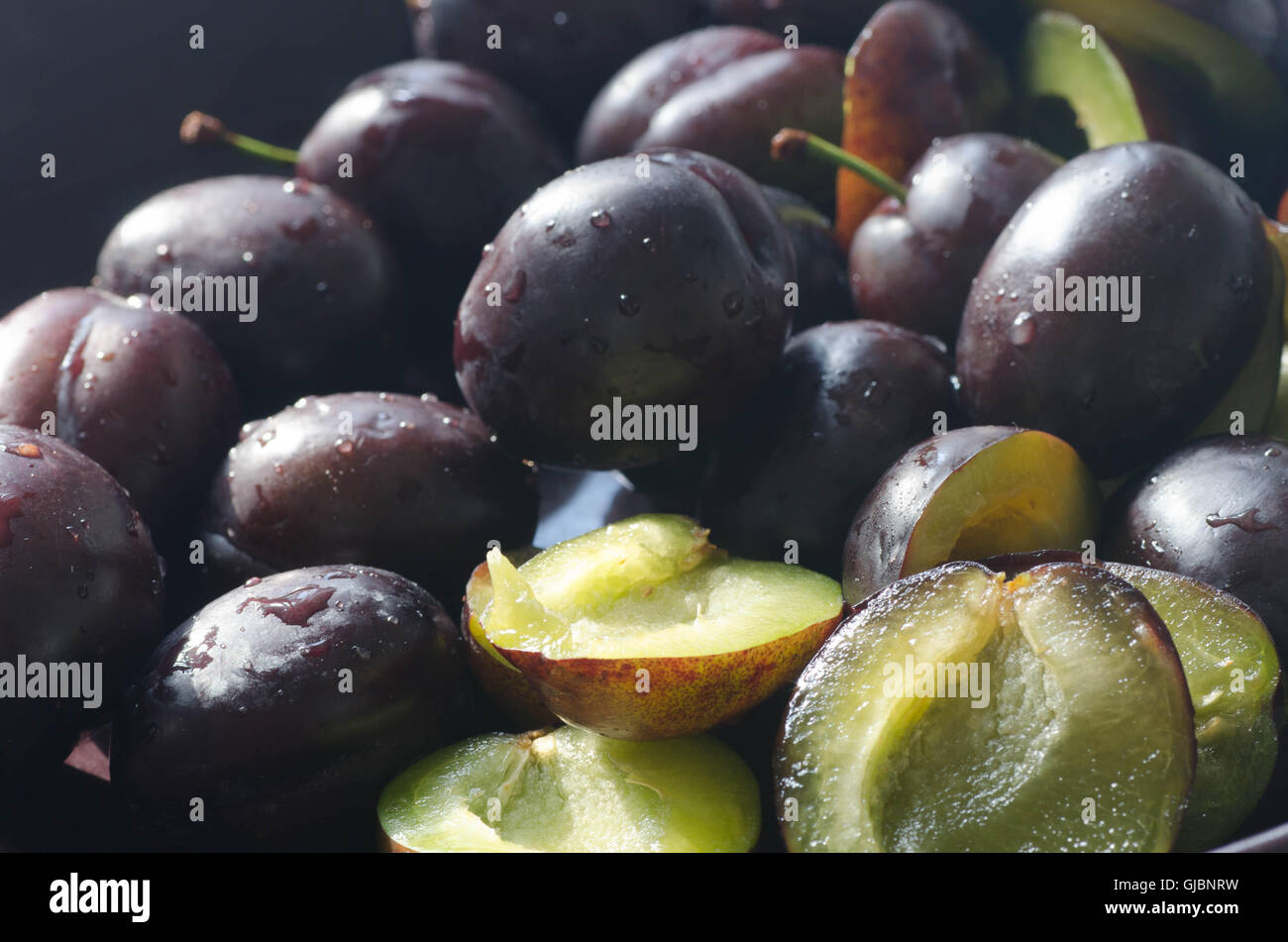 closeup to fresh purple plums Stock Photo - Alamy
