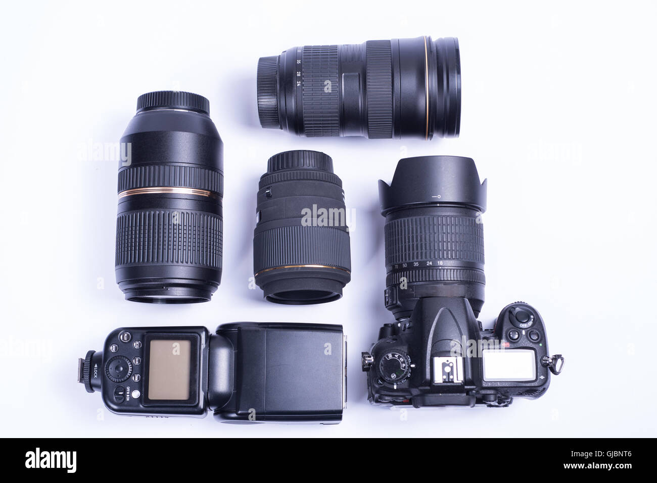 still life of dslr photo equipment on white background Stock Photo - Alamy