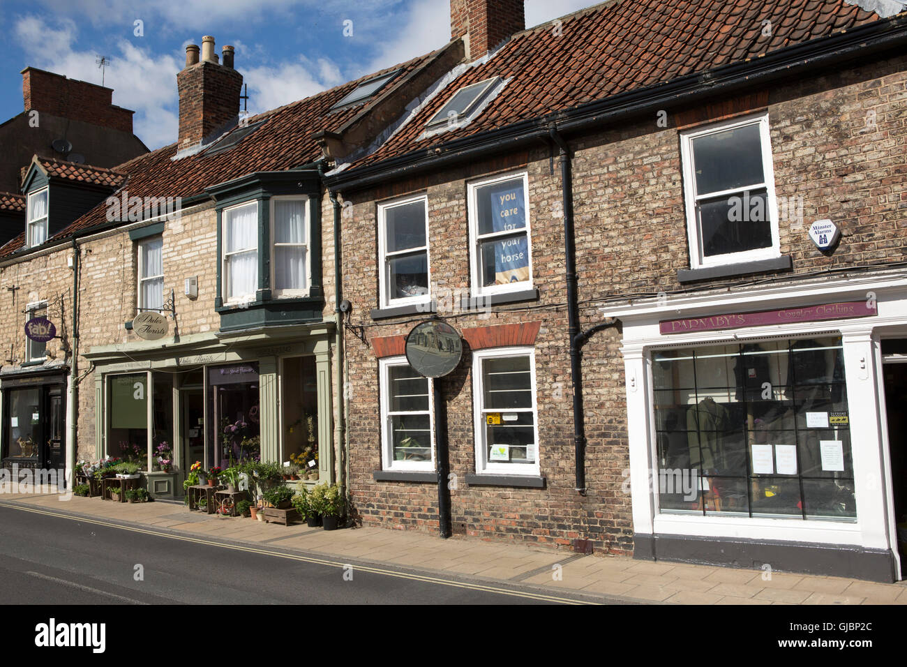 Shopfronts in Malton, North Yorkshire, United Kingdom. A florists and a ...