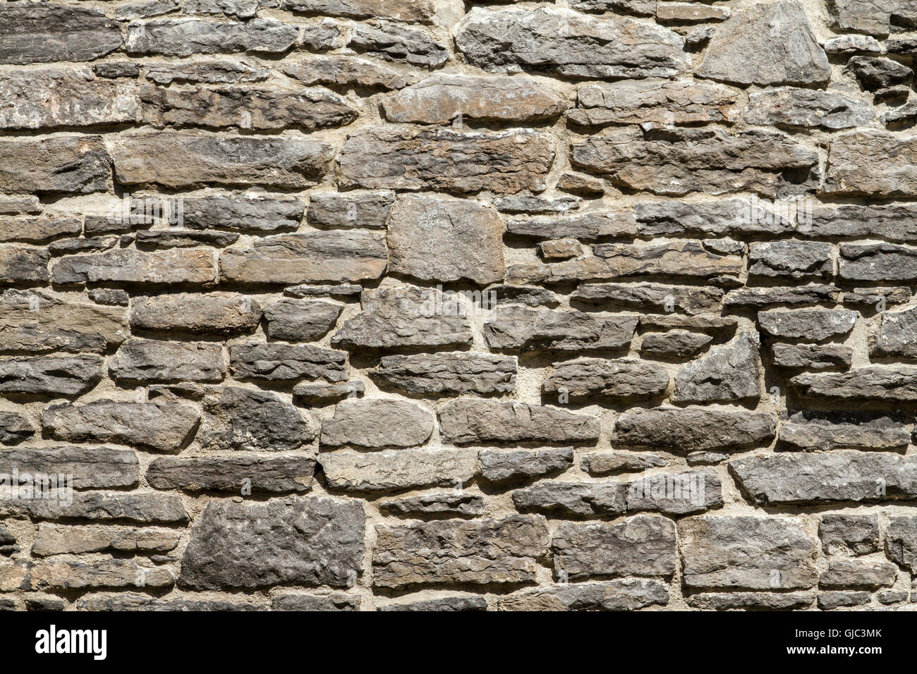 Old stone wall background Stock Photo - Alamy