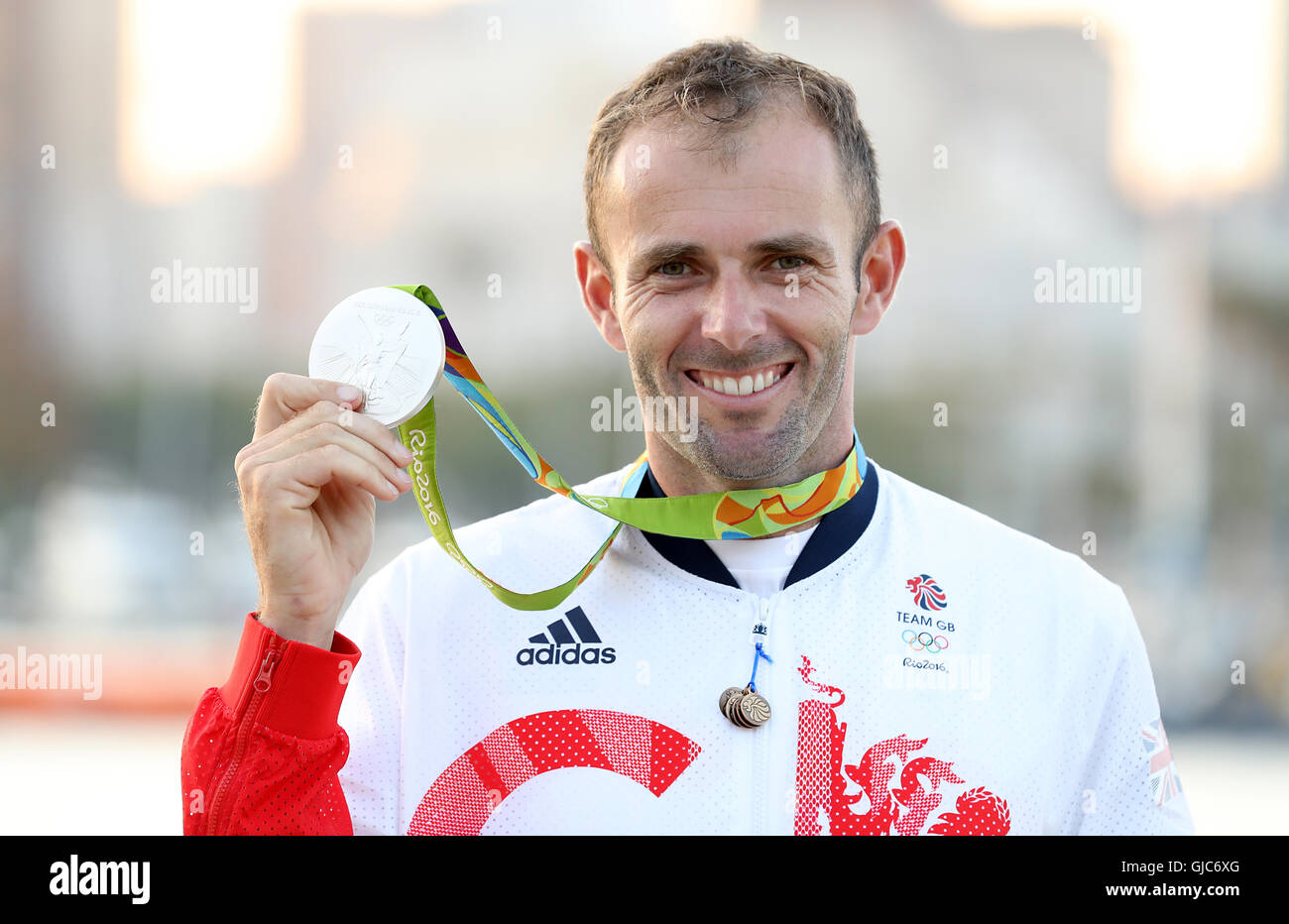 Great Britain's Nick Dempsey poses with his Silver medal he won in the ...