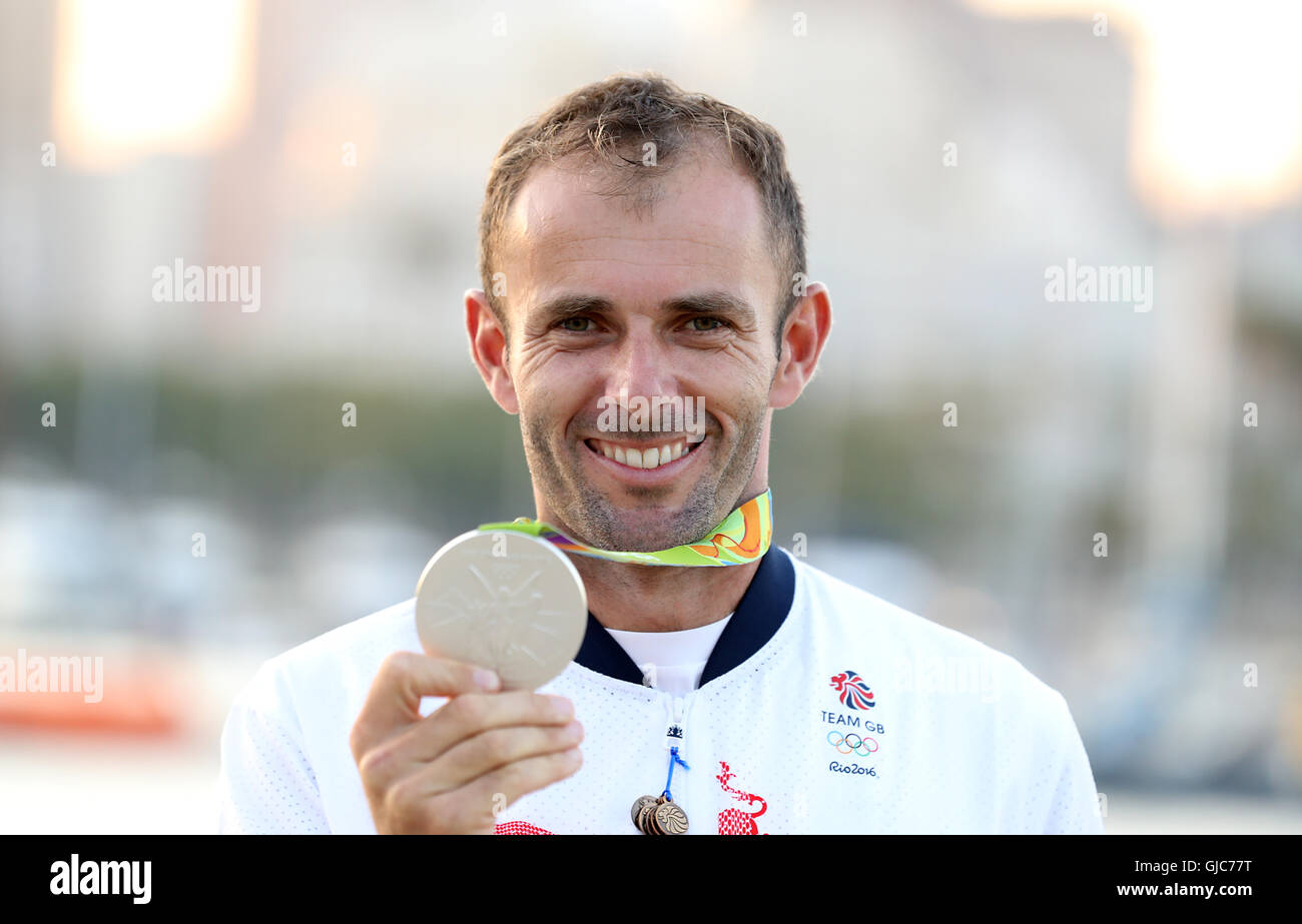 Great Britain's Nick Dempsey poses with his Silver medal he won in the ...