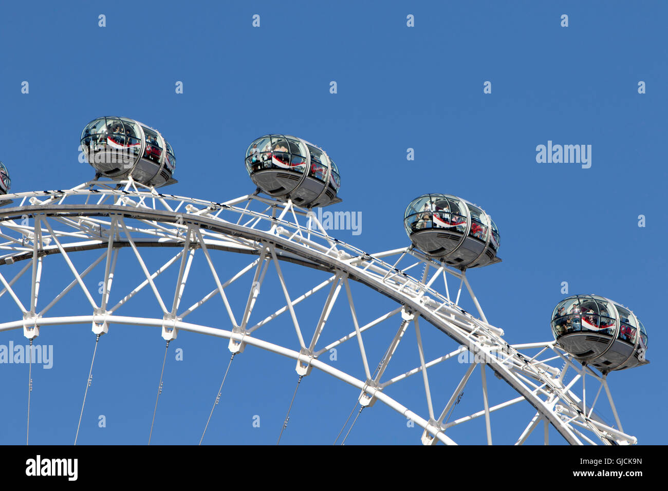 The London Eye giant Ferris wheel on the South Bank of the River Thames ...