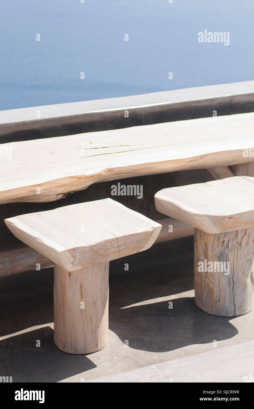 wooden table with chairs, Oia, Santorini, Greece Stock Photo - Alamy