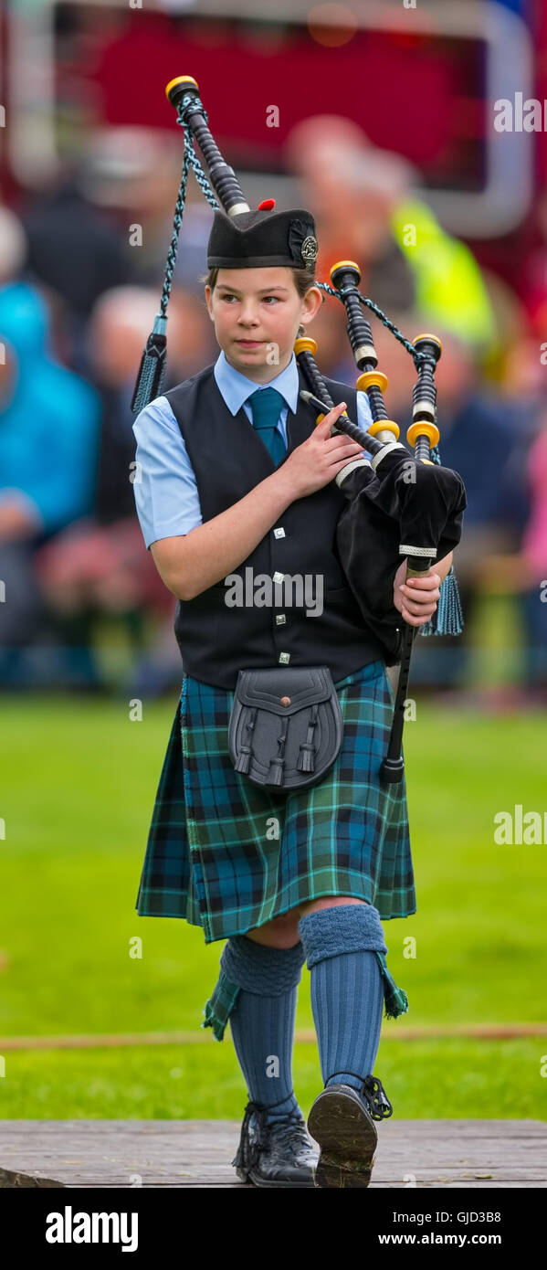 Girl playing bagpipes hi-res stock photography and images - Alamy
