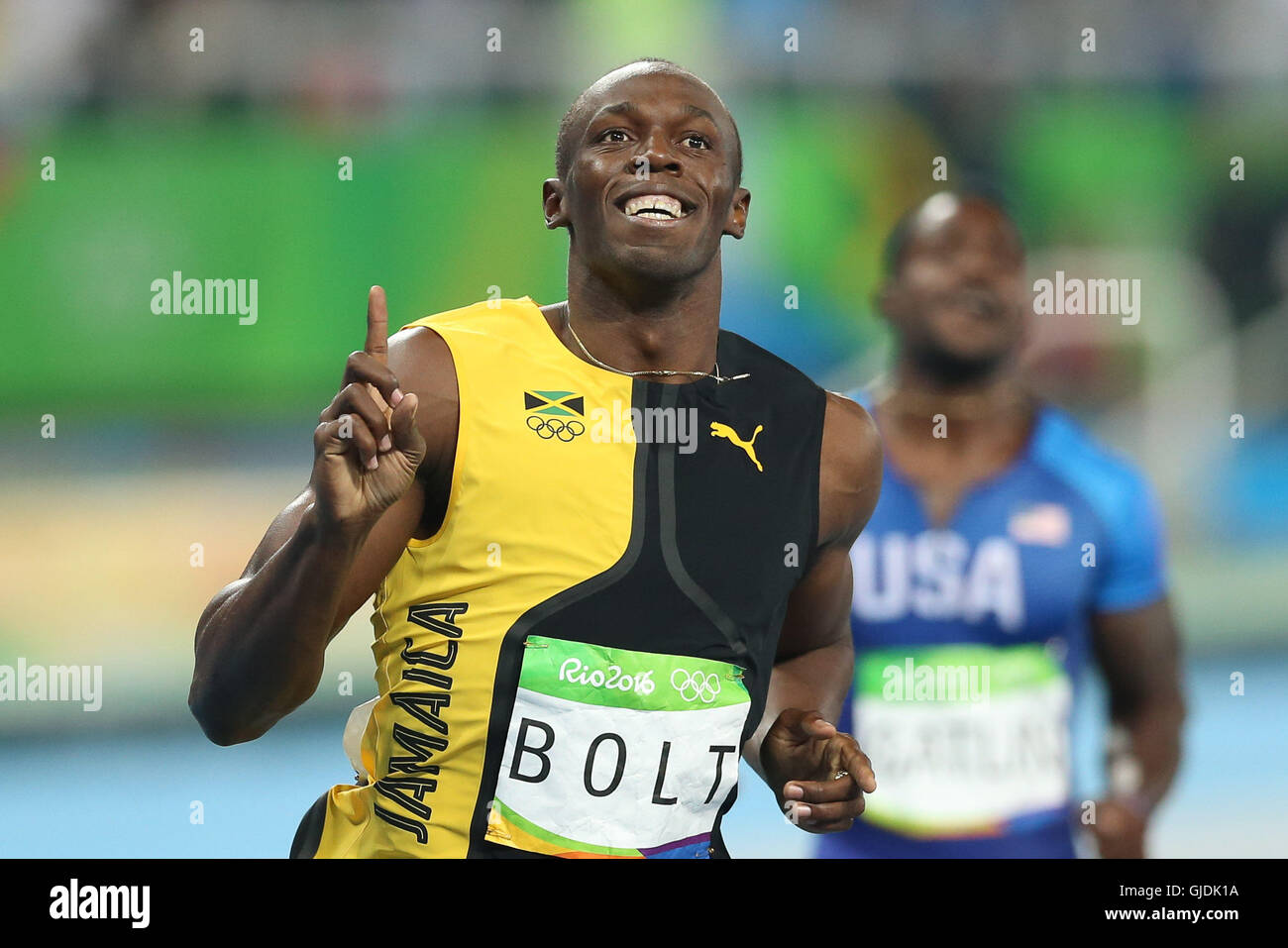 Rio De Janeiro, Brazil. 14th Aug, 2016. Jamaica's USAIN BOLT holds up ...