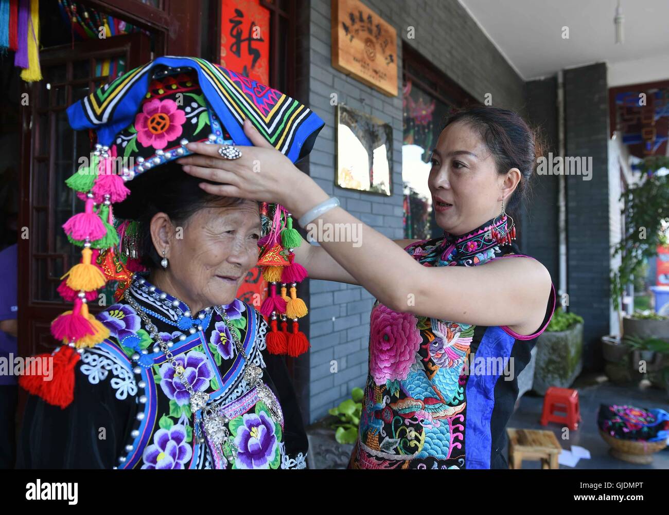 Dayao, China's Yunnan Province. 14th Aug, 2016. Luo Jun displays an ...